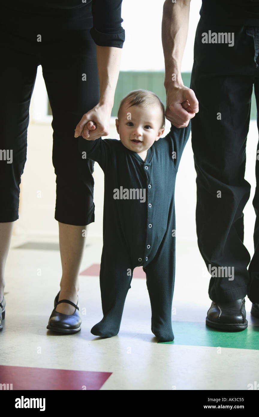 A baby taking first steps Stock Photo - Alamy