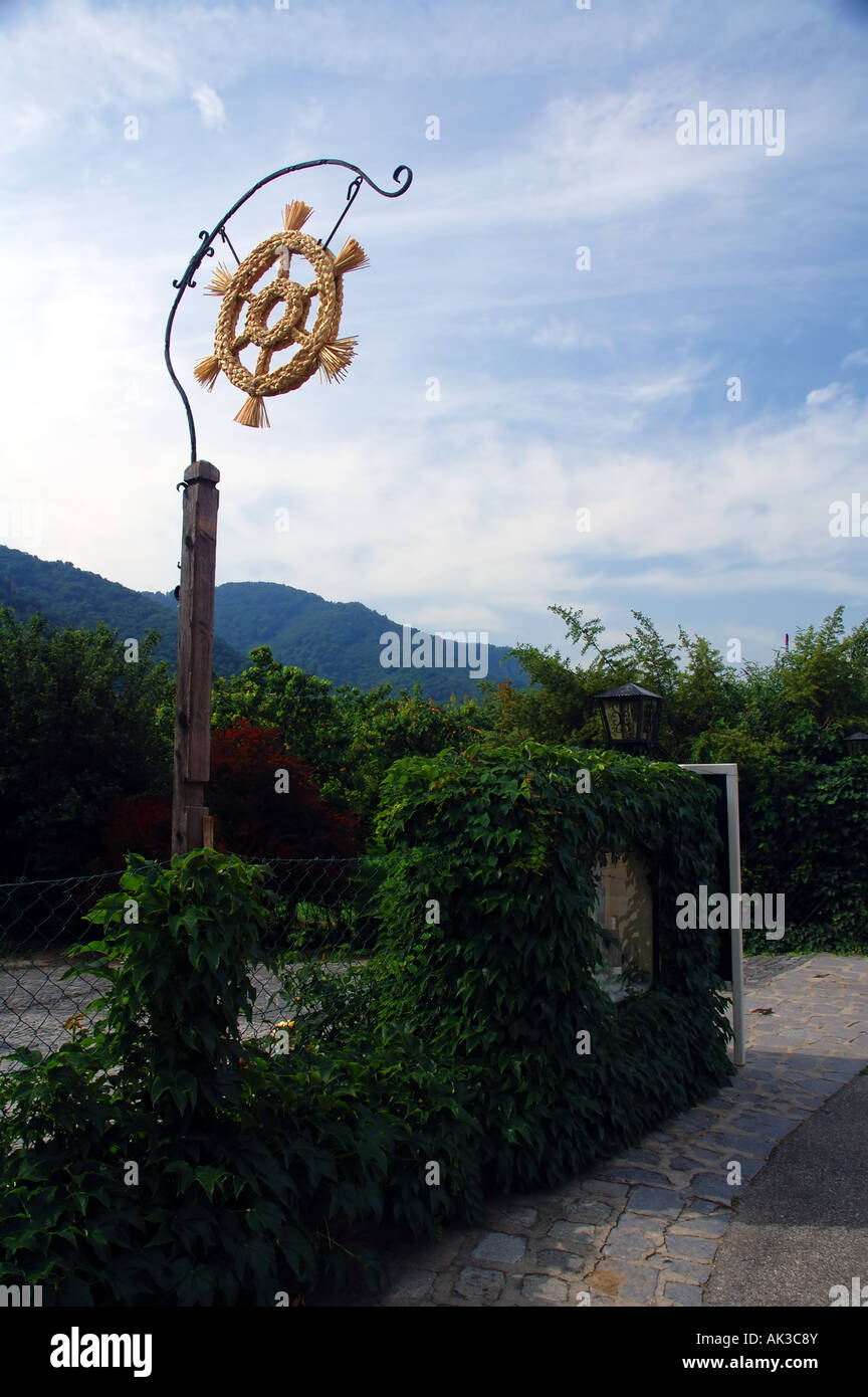 Traditional straw sign signalling that locally produced food and drink ...