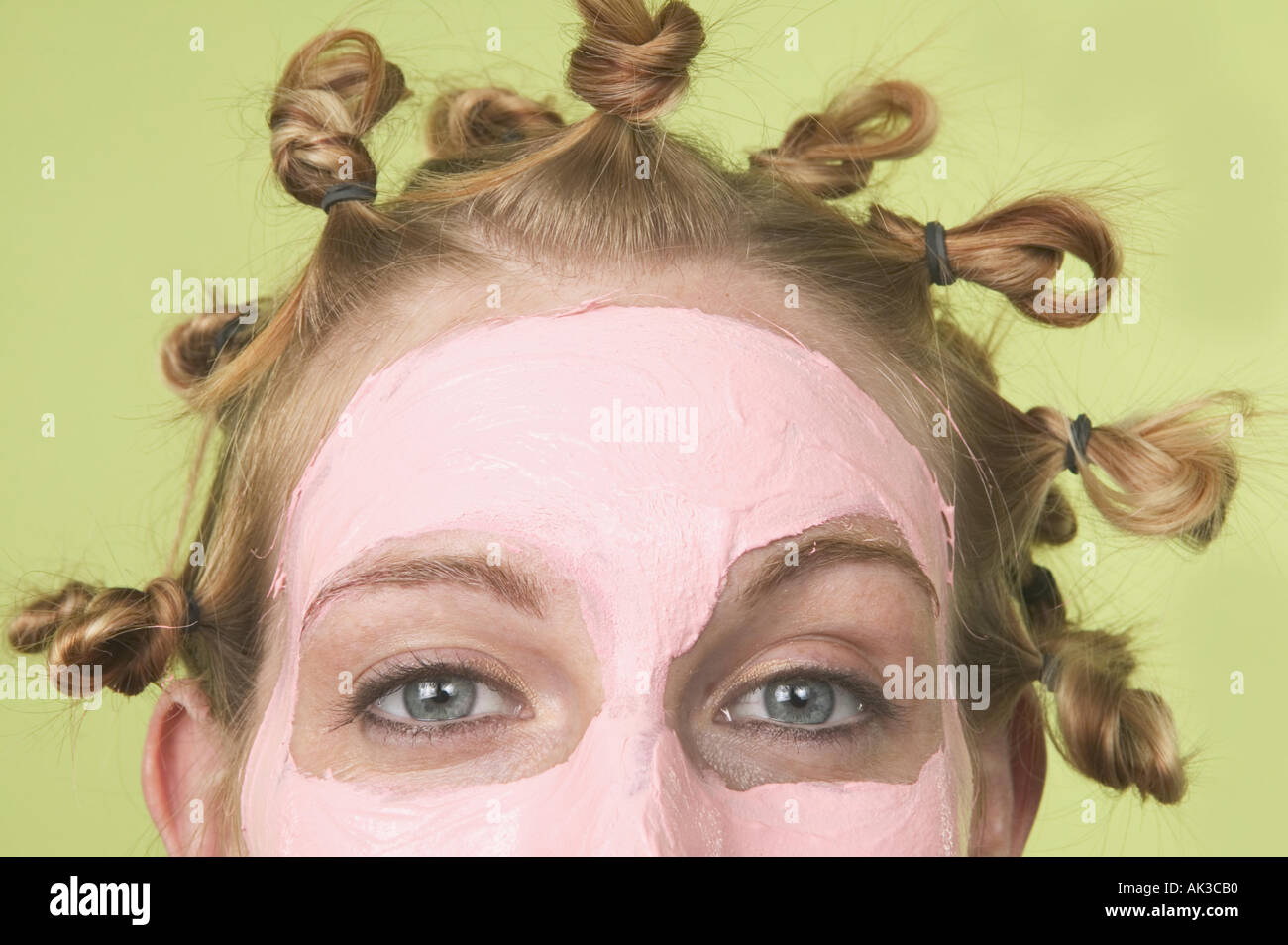 Upper half of a woman s face with pale facial mask on Stock Photo - Alamy
