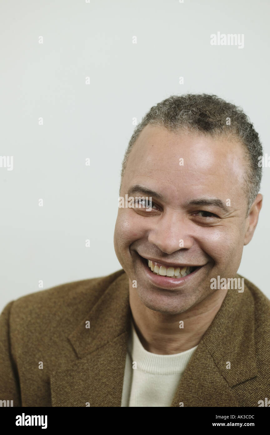 A man smiling at the camera Stock Photo - Alamy