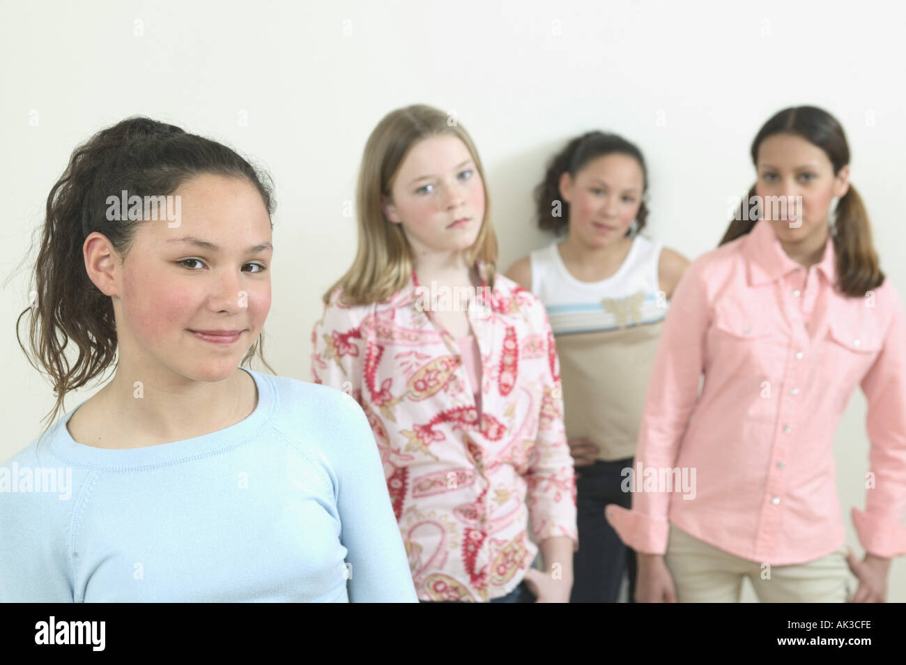 Studio portrait of four teenage girls Stock Photo - Alamy