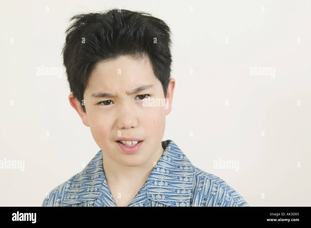 A teenage boy with a puzzled expression Stock Photo - Alamy