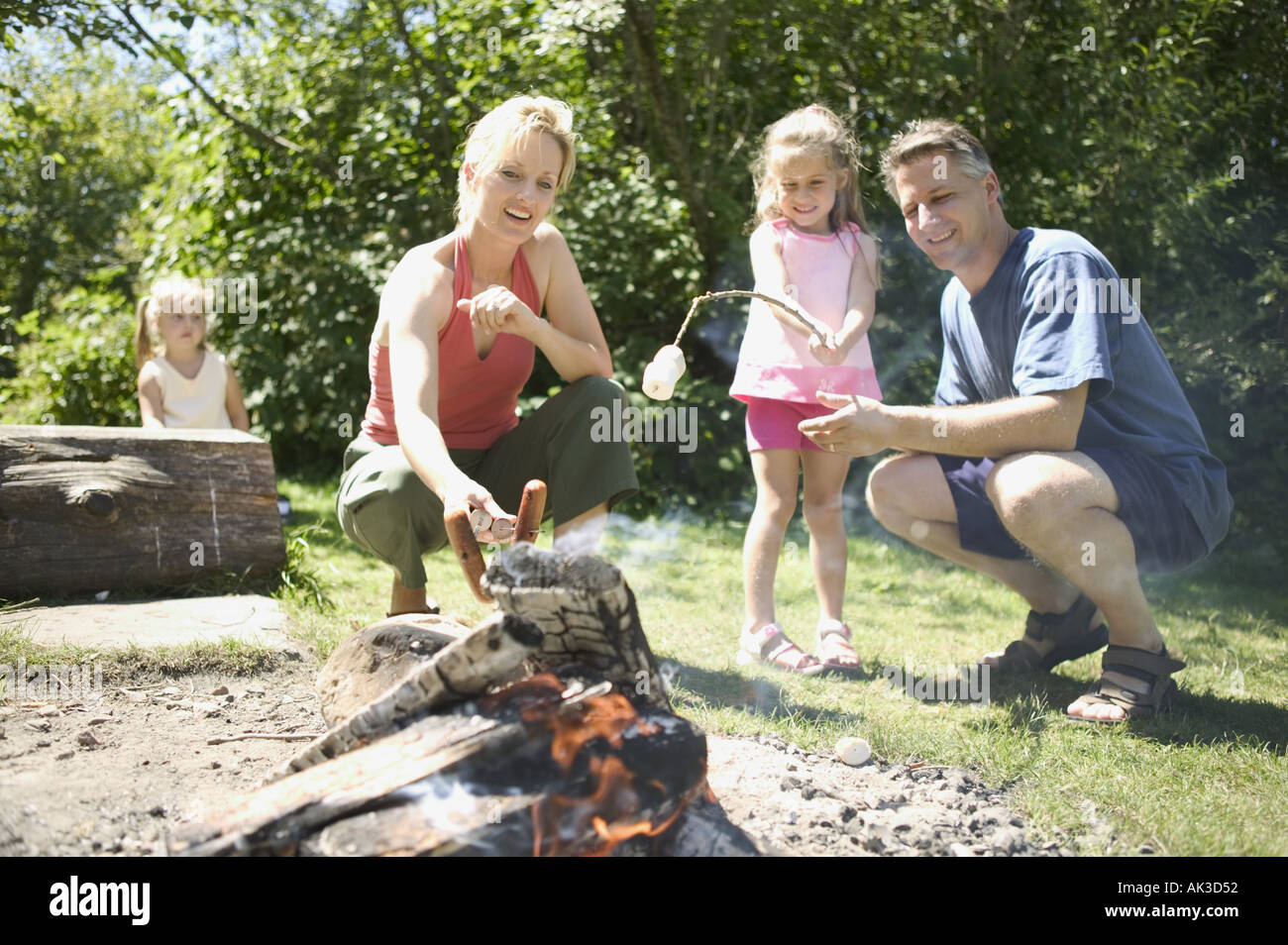Family Around Open Fire High Resolution Stock Photography and Images ...