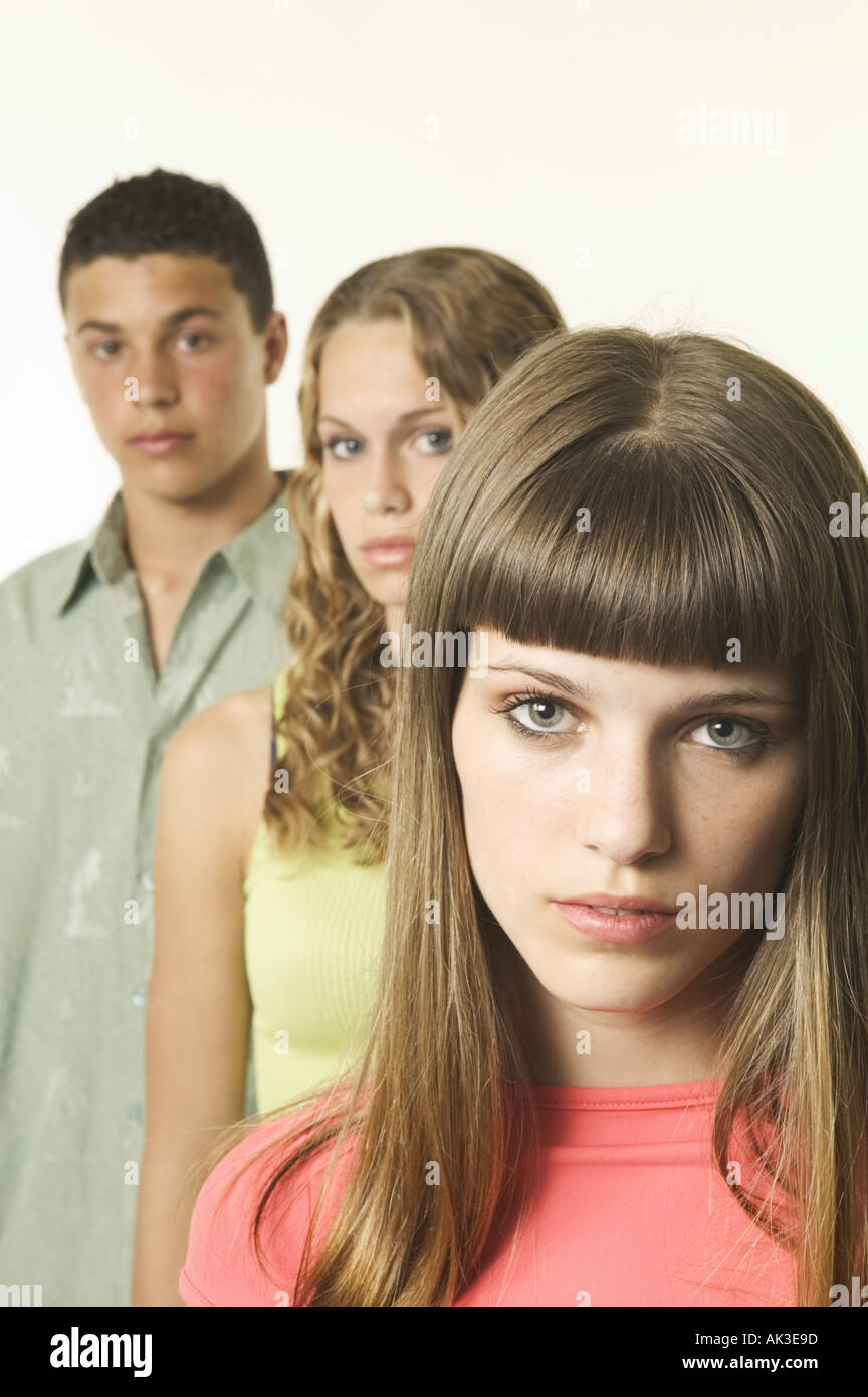 Studio portrait of three teens Stock Photo - Alamy