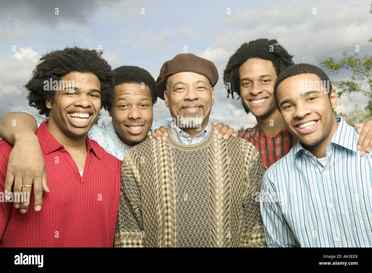 Portrait of a father and his four grown sons Stock Photo - Alamy