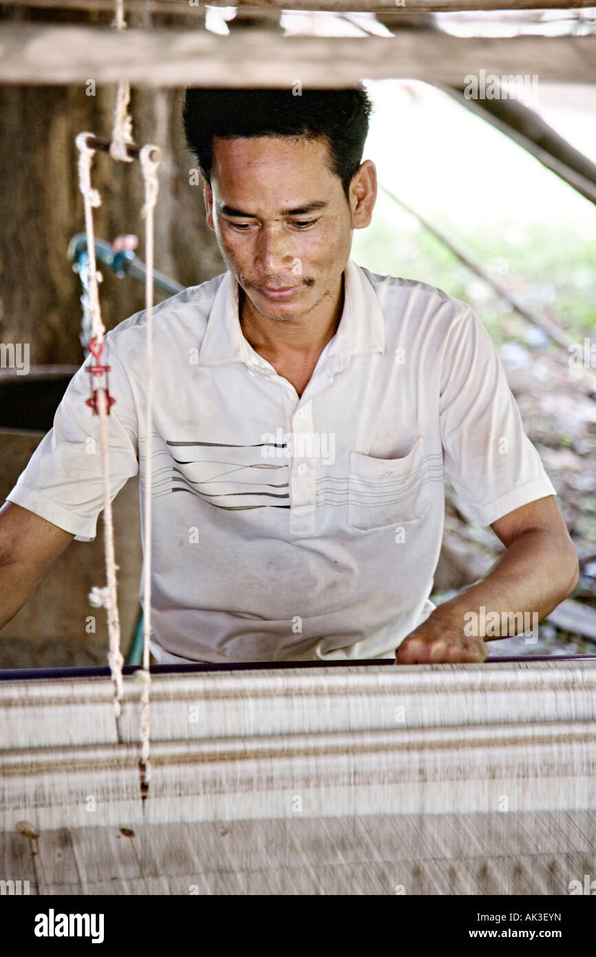 Man weaving silk at hand loom Mekong Island Phnom Penh Cambodia Stock ...