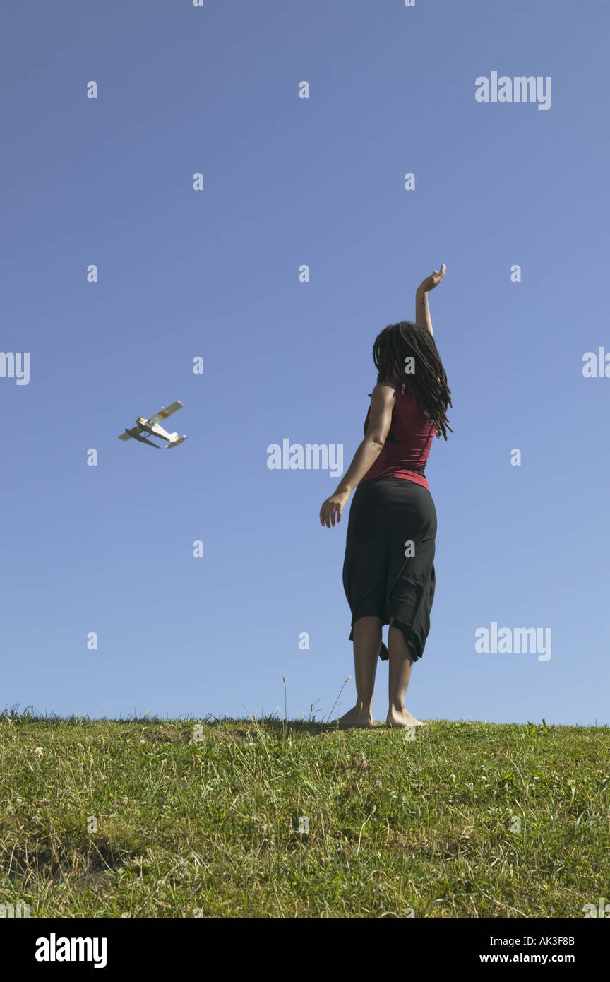 Waving goodbye back view hi-res stock photography and images - Alamy