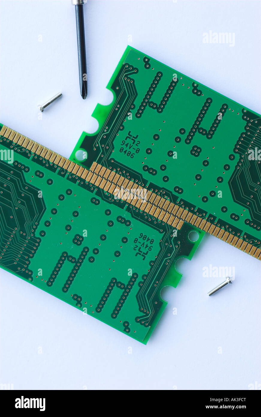 Memory boards, screwdriver and two screws Stock Photo - Alamy