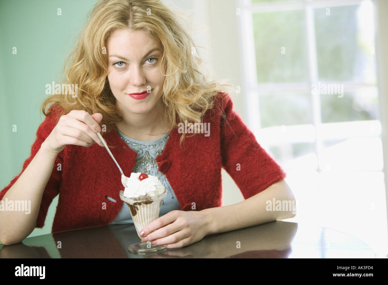 Pretty women eating desserts hi-res stock photography and images - Alamy