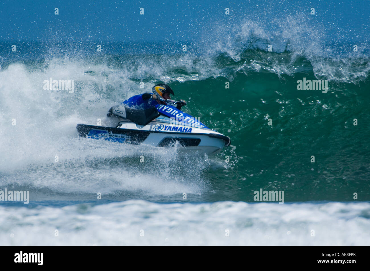 man speeding on jet ski Stock Photo - Alamy