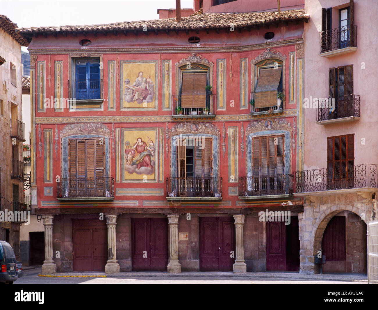 Frescoed houses and arcade in Plaza de España Graus Aragon Spain Stock ...