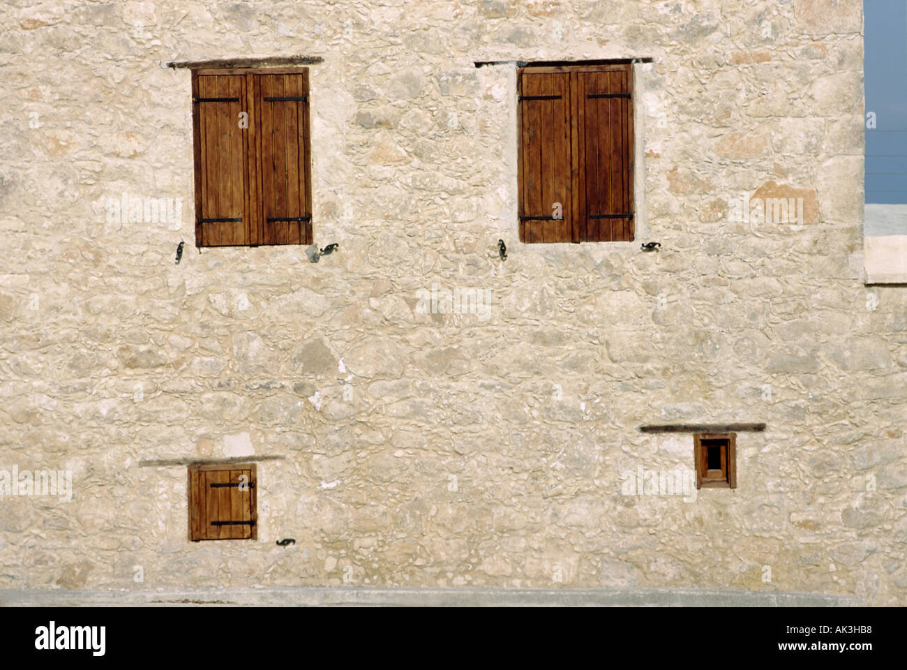 Closed Shutters on Stone built house in Drouseia Cyprus Stock Photo - Alamy