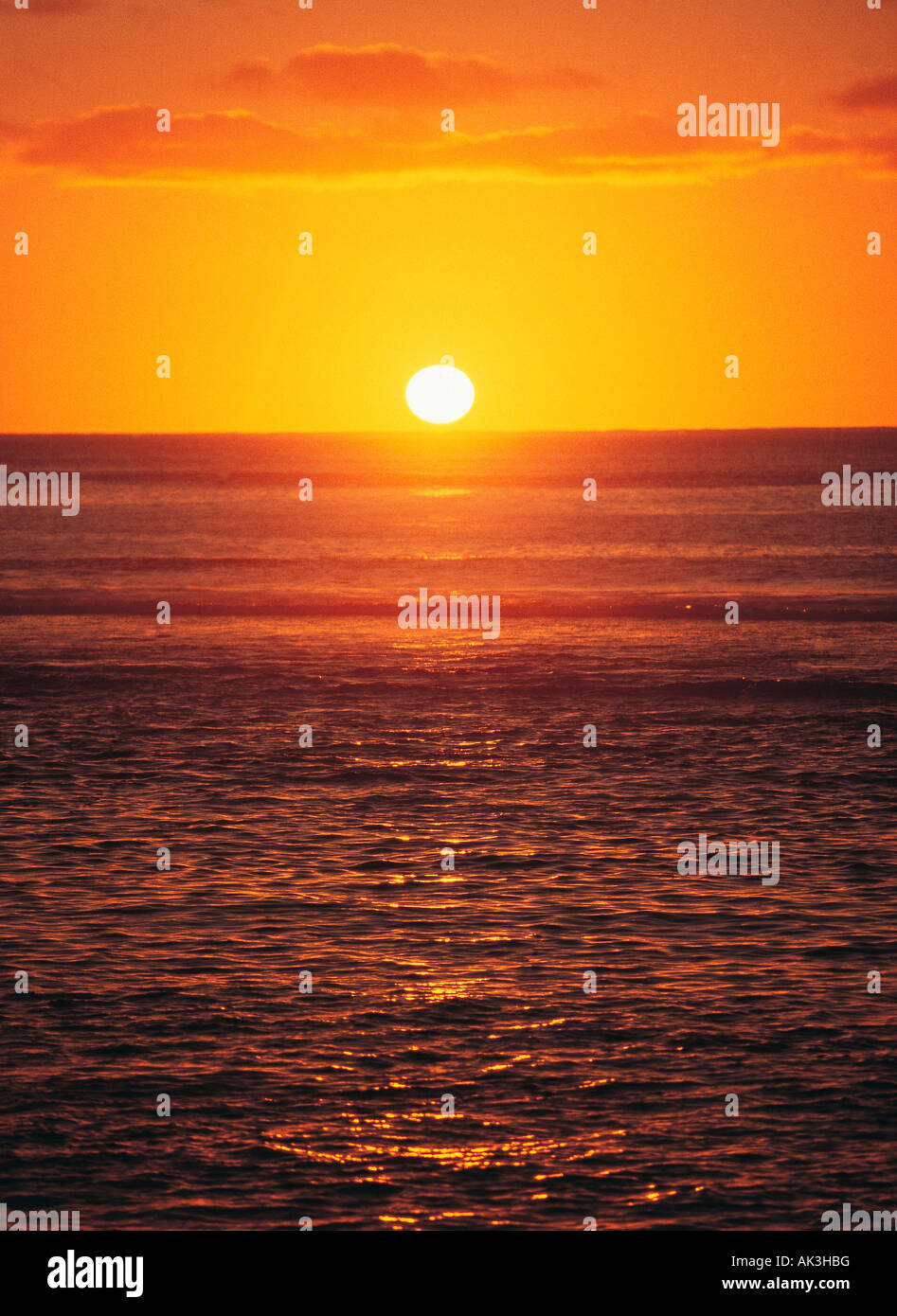 Sun rising above sea waves hi-res stock photography and images - Alamy