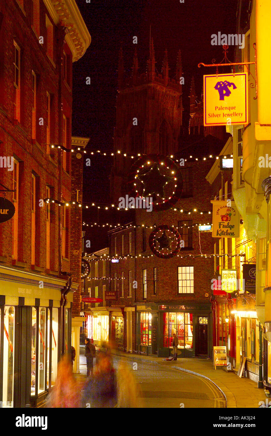 Low Petergate at night with Christmas lights, with York Minster just ...