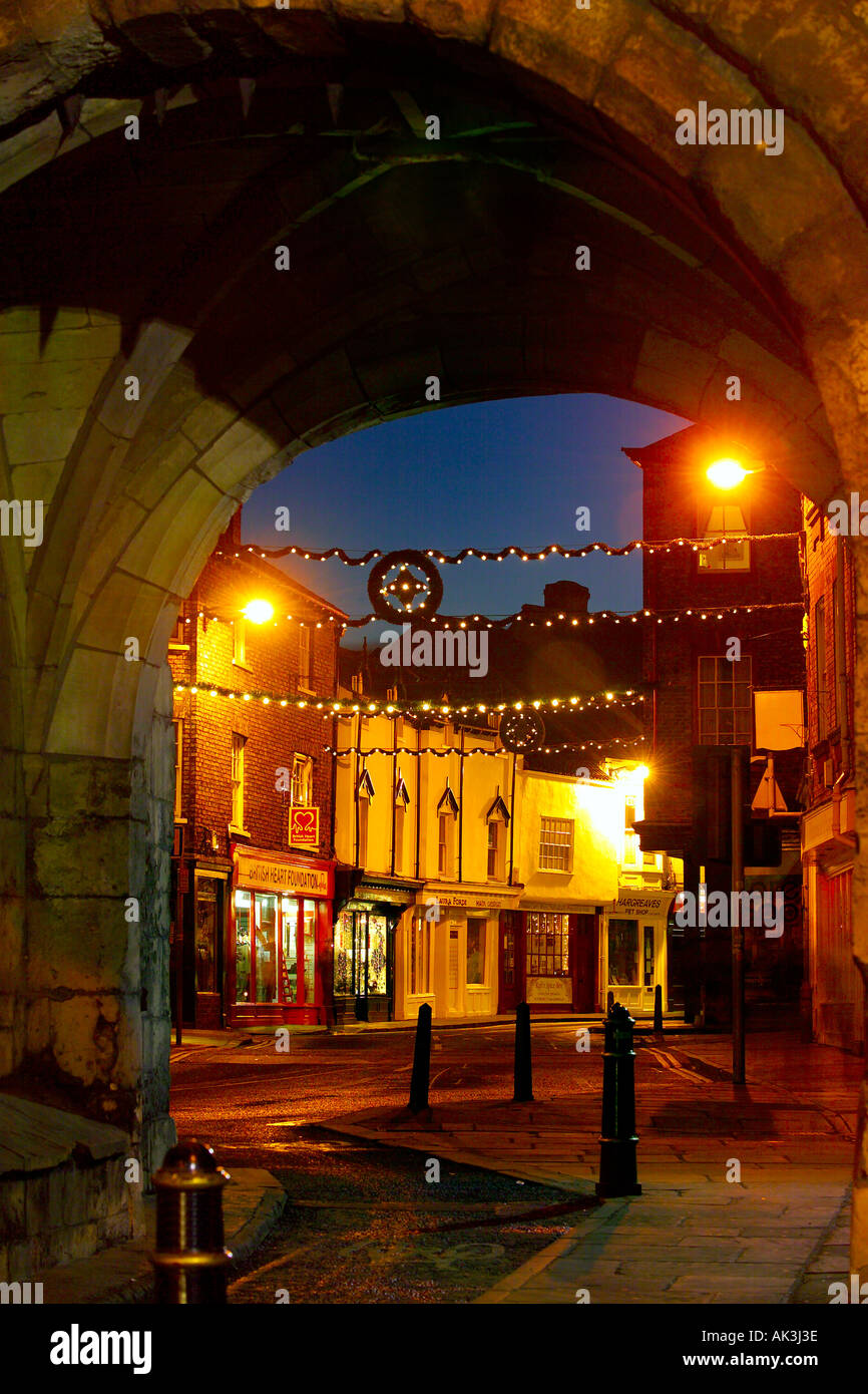 Goodramgate at night with Christmas lights, viewed through the medieval ...