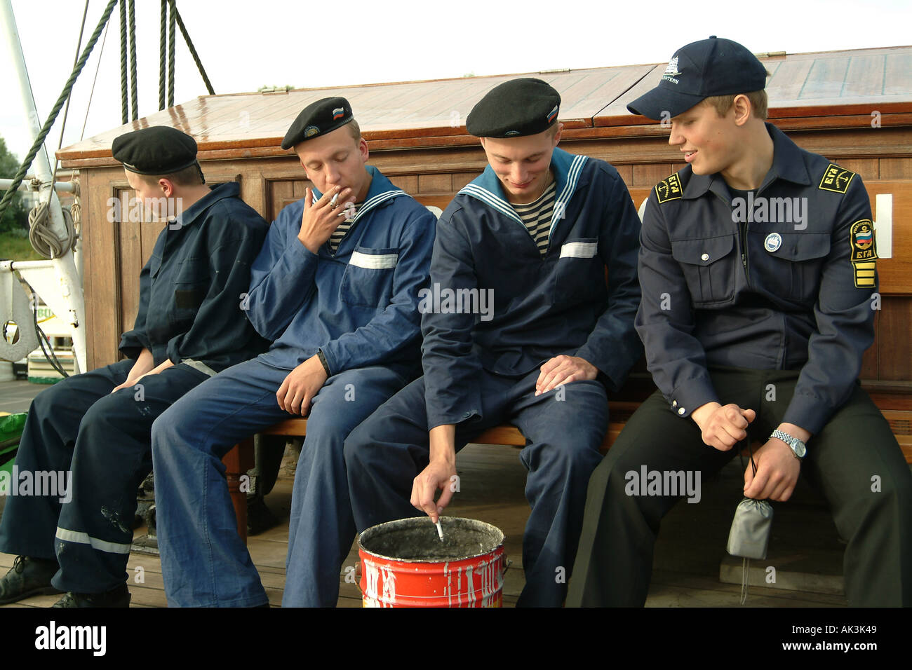Cadet sailors from the Russian Federation navy relaxing and smoking on ...