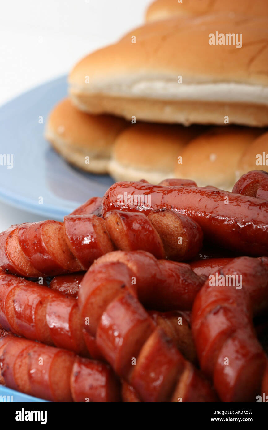 Roasted sausages with plain buns closeup close up from front view ...