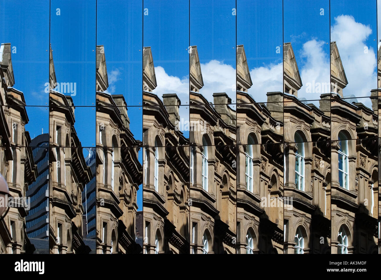 Old Buildings Reflected in a Modern Mirrored Frontage at The Bourse ...