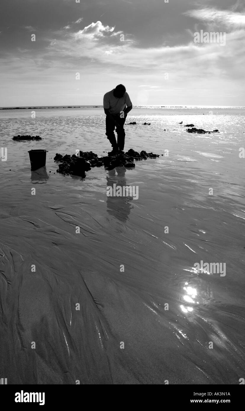Fishing man on beach Black and White Stock Photos & Images - Alamy