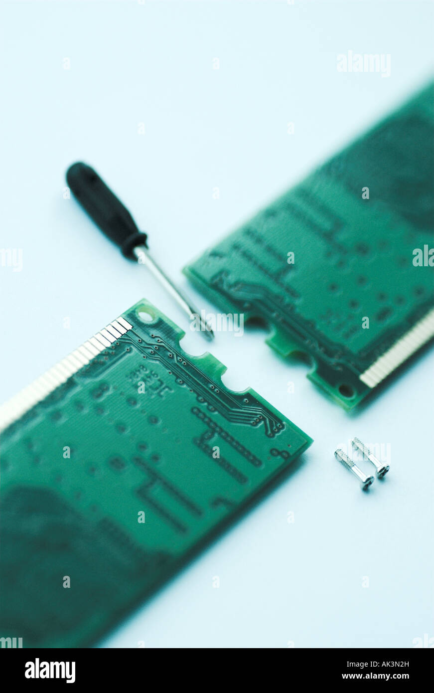 Memory boards, screwdriver and two screws Stock Photo - Alamy