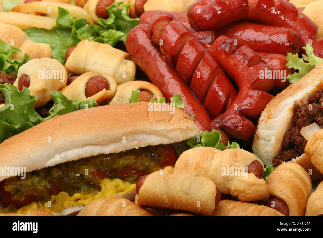 Mini sausage hot dog finger rolls from front view background display ...