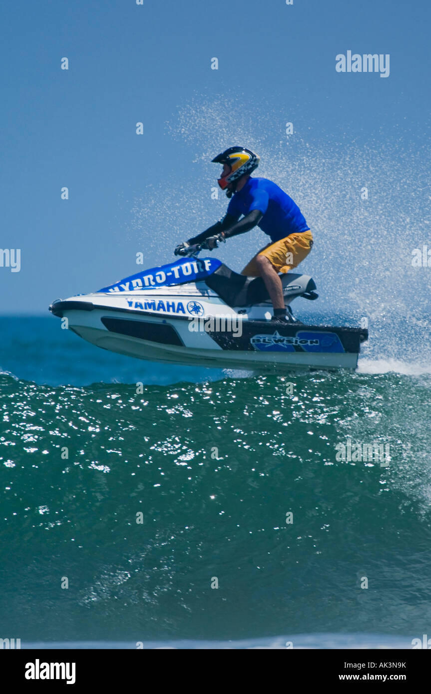 man speeding on jet ski Stock Photo - Alamy