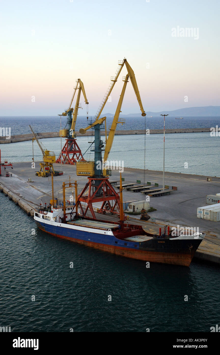 Cargo ship loading at Crete Stock Photo - Alamy