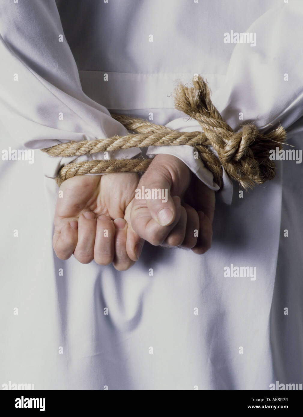 Hands Tied Rope High Resolution Stock Photography and Images - Alamy