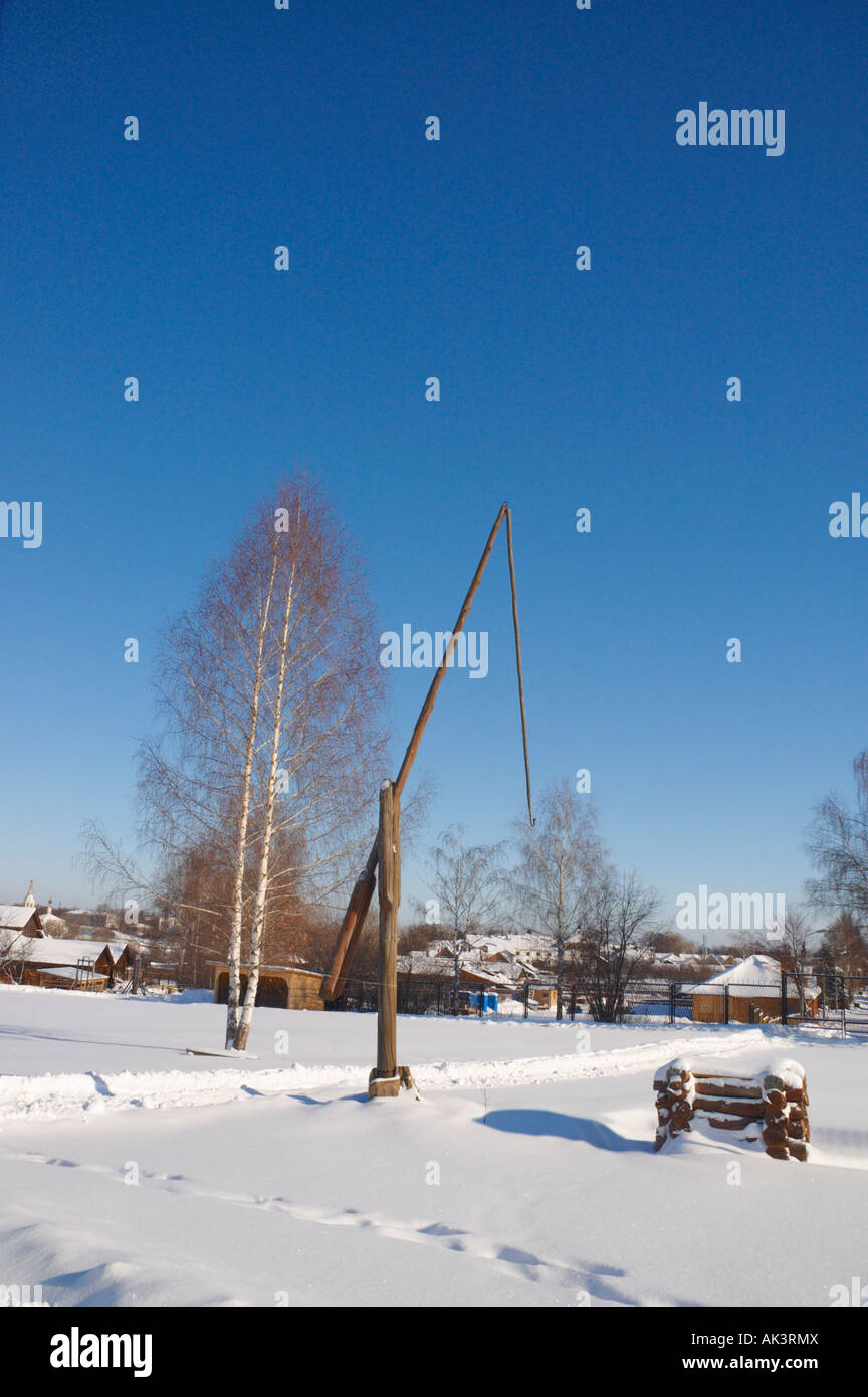 Draw well on snow field Stock Photo - Alamy