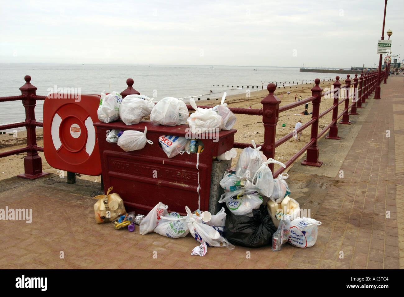 litter dumped after a day at the beach Stock Photo - Alamy