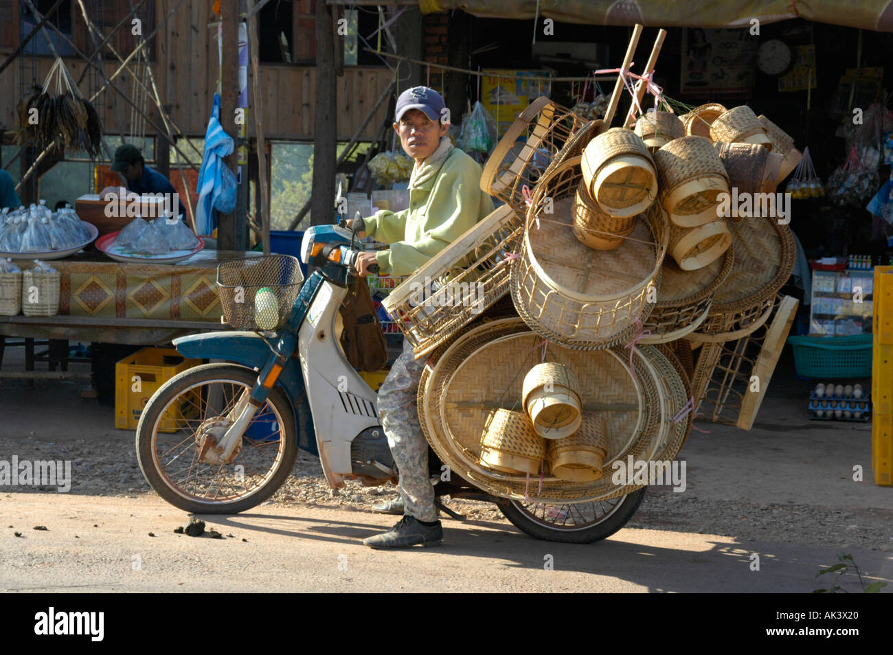 Man driving overloaded motorcycle hi-res stock photography and images ...