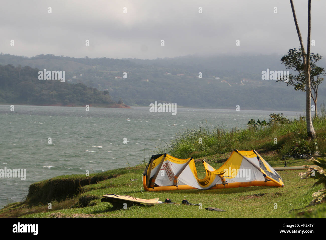 kite boarding in costa rica lake arenal Stock Photo - Alamy