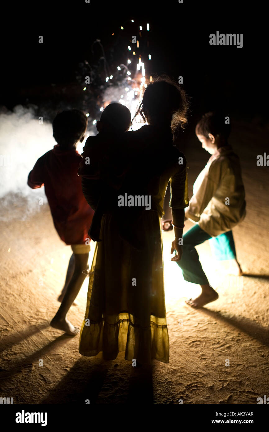 Children playing with firecrackers hi-res stock photography and images ...