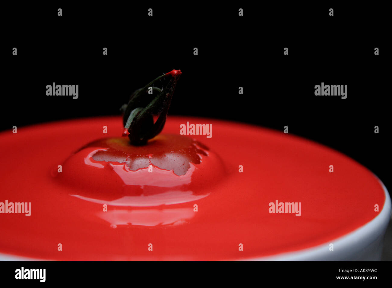 tomato in red paint Stock Photo - Alamy