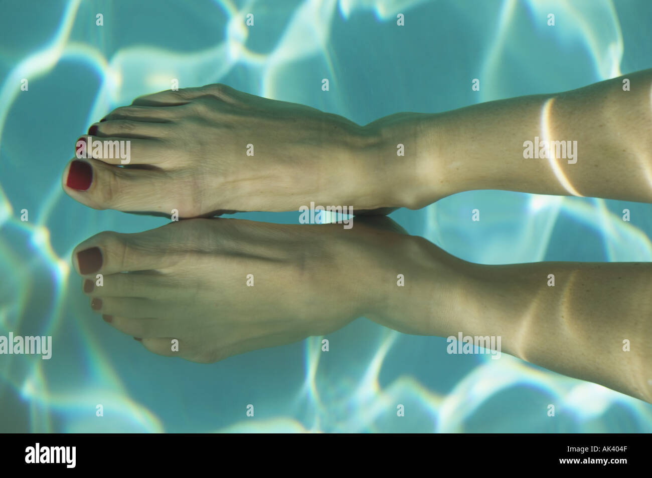 Female feet red painted toe hi-res stock photography and images - Alamy