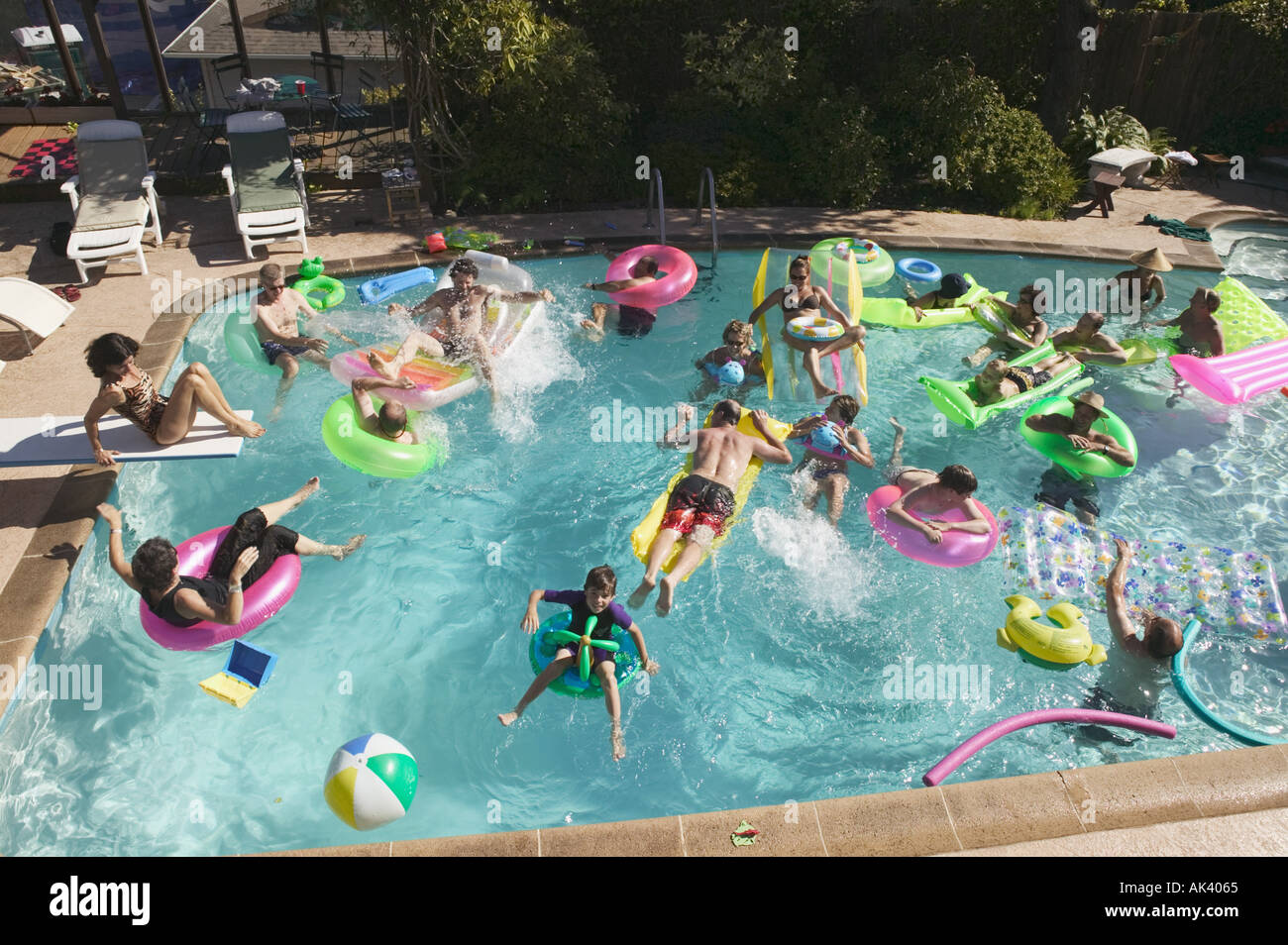 Overhead view of a pool party Stock Photo - Alamy
