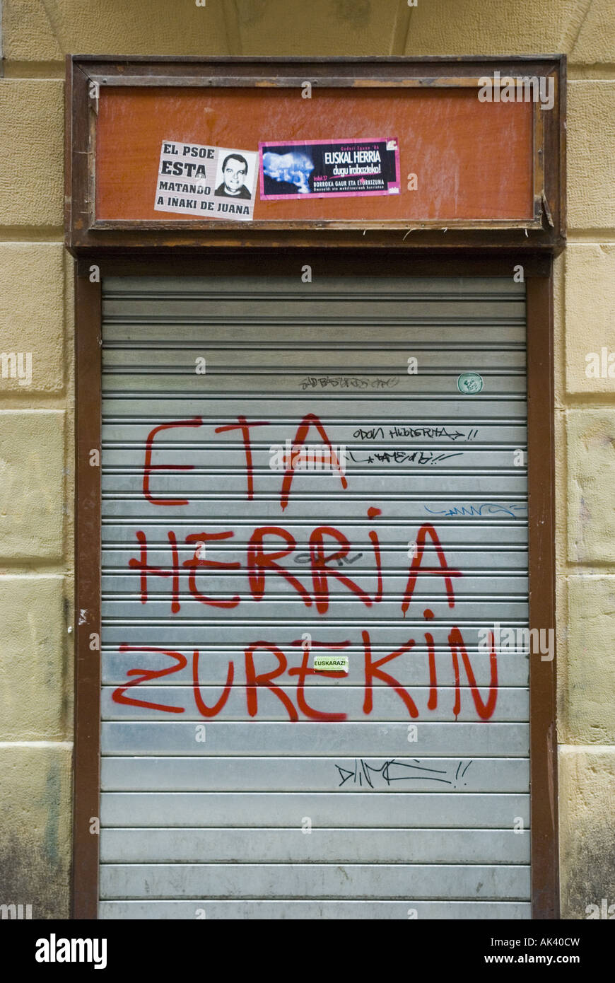 Euskadi Ta Askatasuna (ETA) related graffiti on a steel roller door in ...