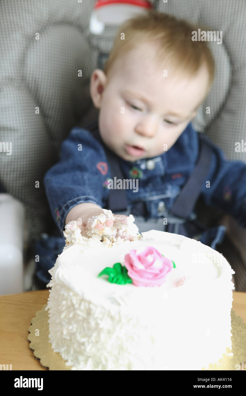 Hand reaching out for cake hi-res stock photography and images - Alamy