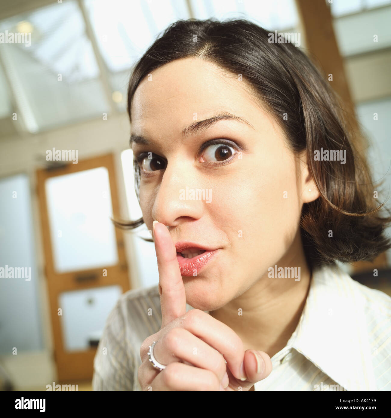 Whisper finger close hi-res stock photography and images - Alamy