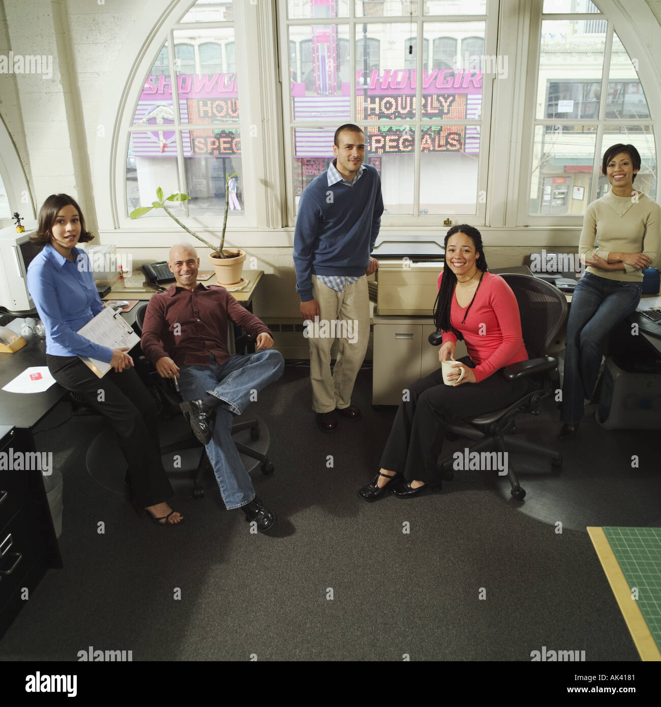 Five colleagues posing hi-res stock photography and images - Alamy