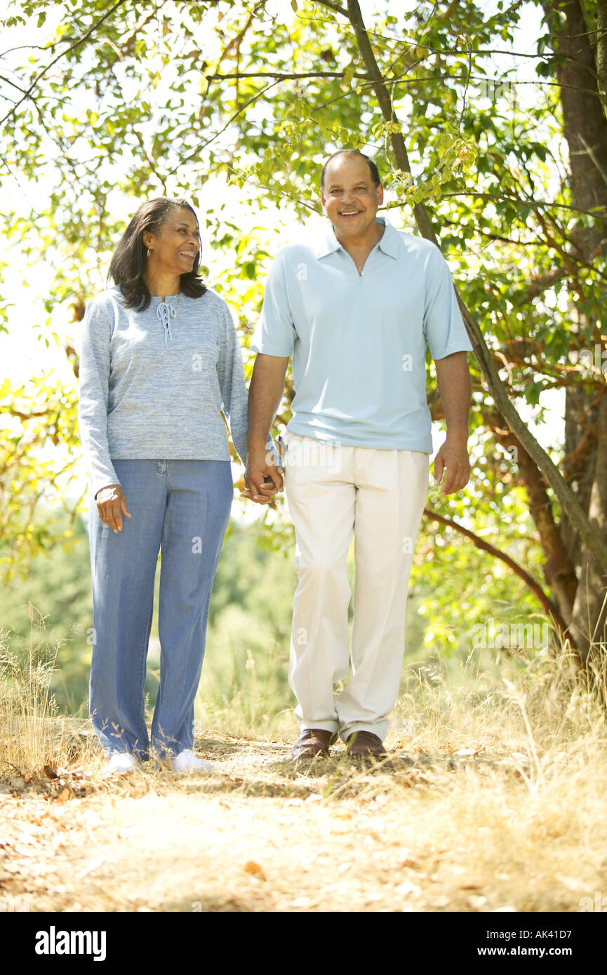 Couple strolling in the country Stock Photo - Alamy