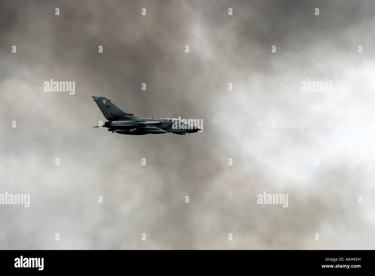 tornado jet flying through smoke Stock Photo - Alamy