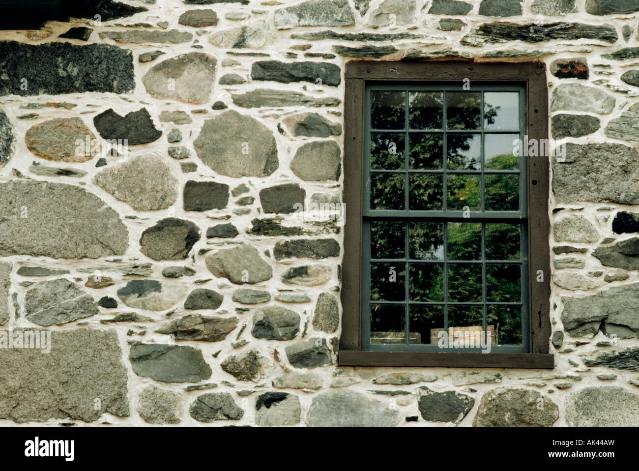 Stone wall with a window Stock Photo - Alamy