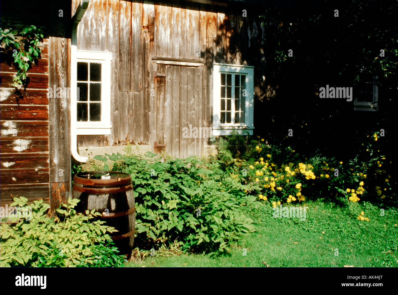 Wooden building and garden Stock Photo - Alamy