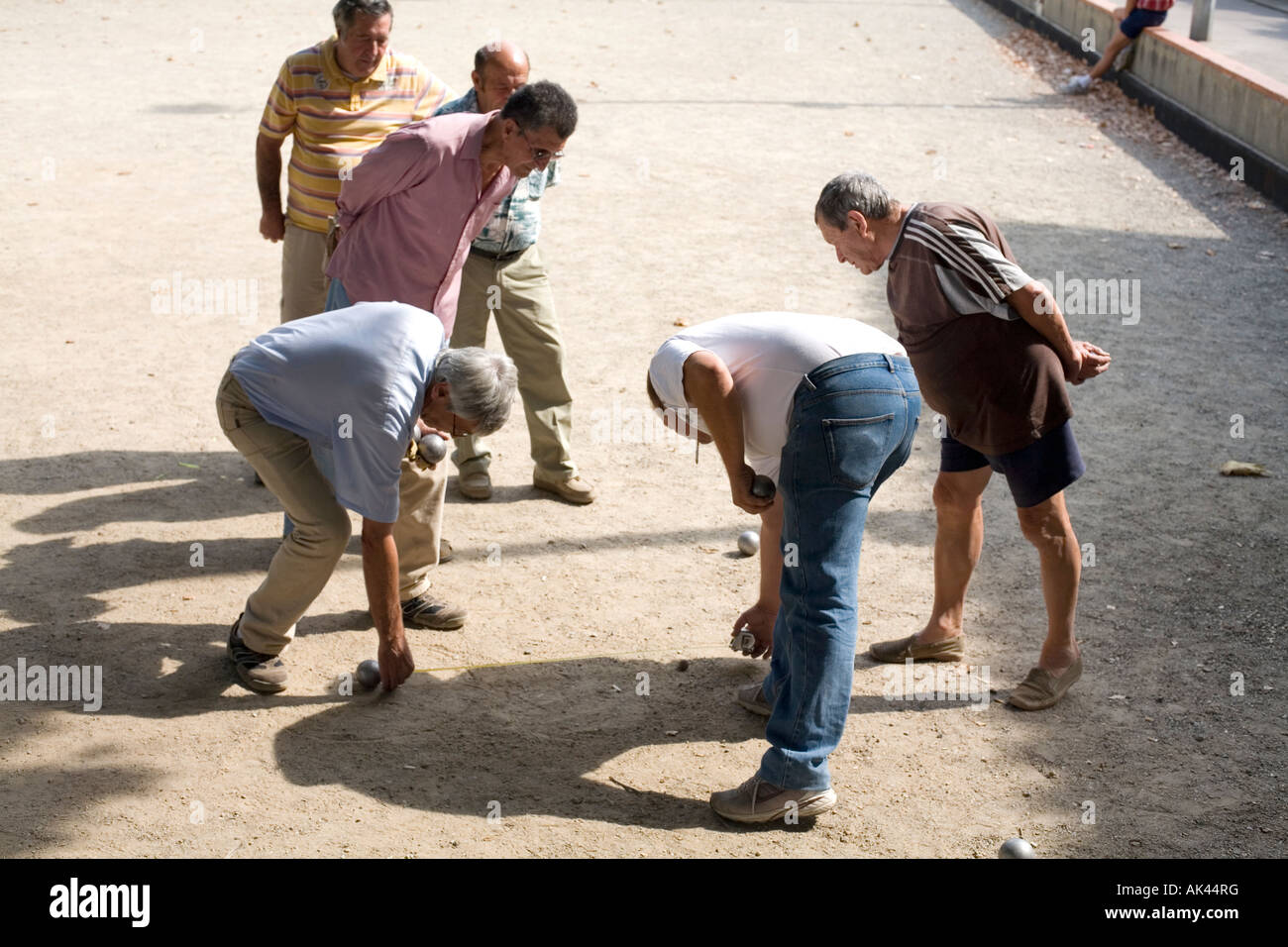 men playing traditional game of Boules in France Stock Photo - Alamy
