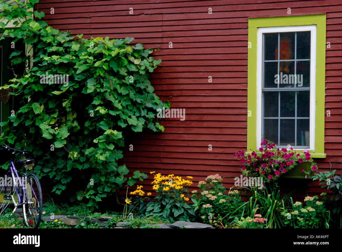 Exterior of red house and garden Stock Photo - Alamy