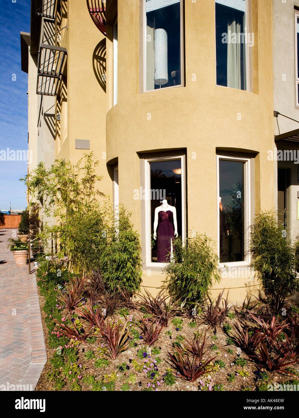 Exterior Shot of Yellow Stucco Store Front Stock Photo - Alamy
