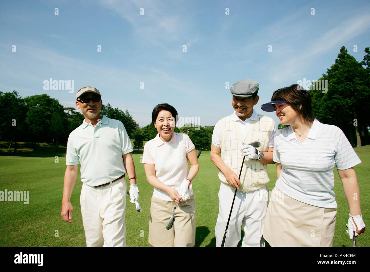 Three people walking on golf hi-res stock photography and images - Alamy