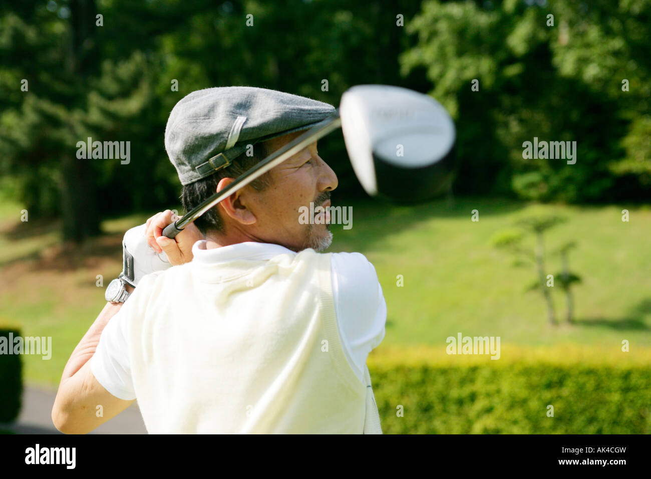 Holding motion standing golf swing golf club hi-res stock photography ...