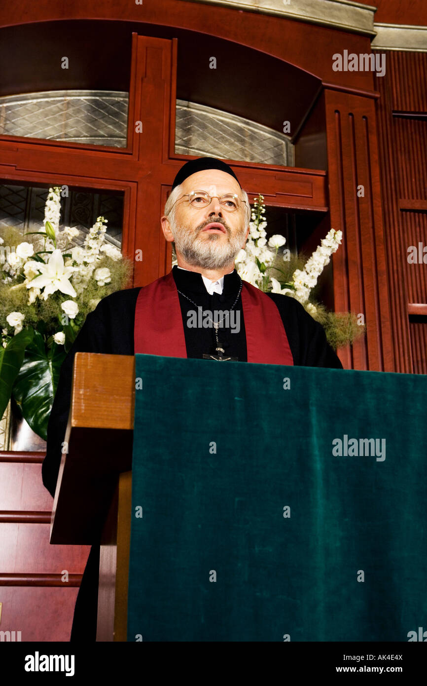Portrait of minister in church Stock Photo - Alamy